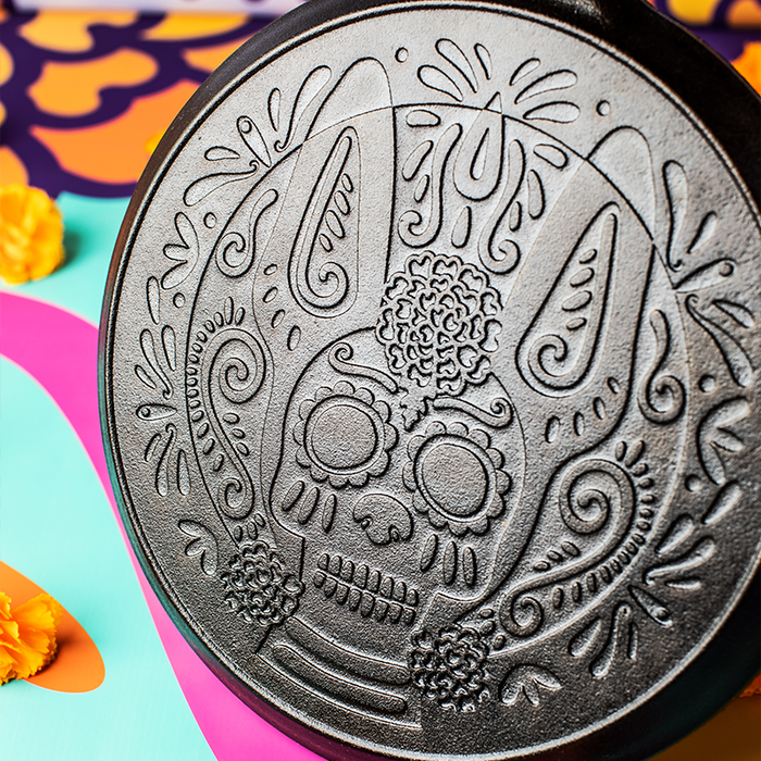 Xolo Sugar Skull Griddle with Deluxe Handle Holder | Lodge Cast Iron