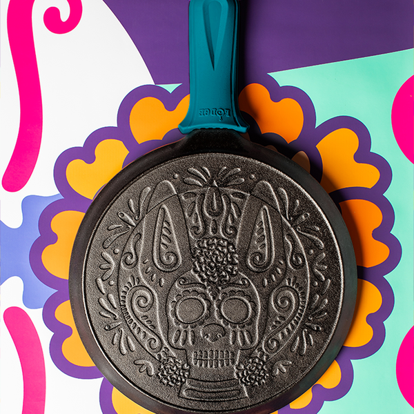 Xolo Sugar Skull Griddle with Deluxe Handle Holder | Lodge Cast Iron
